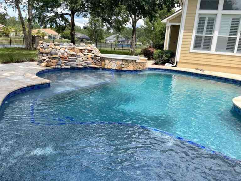 Matching Your Gunite Pool with Your Home's Architecture
